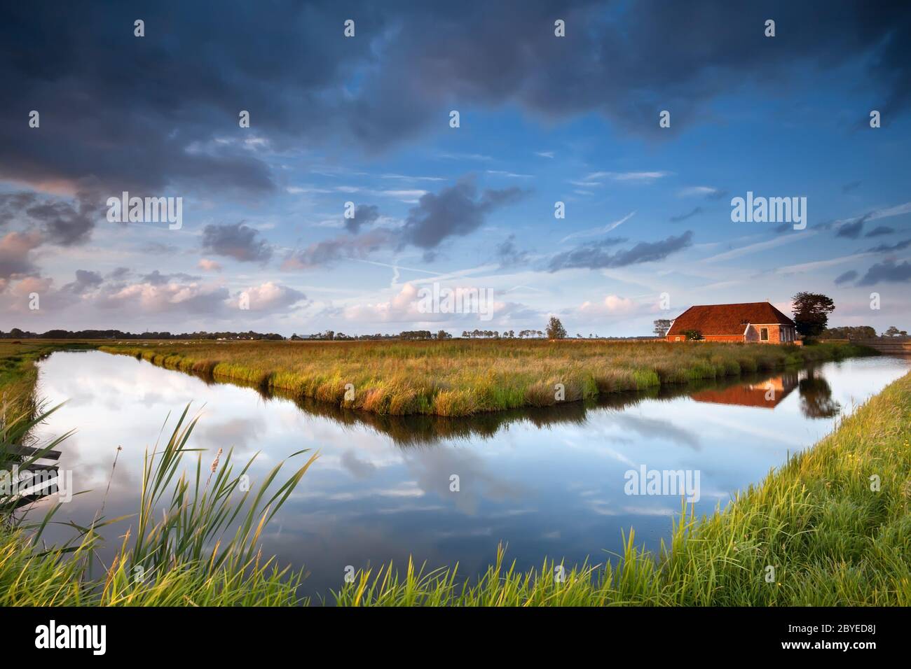 river and charming farmhouse Stock Photo - Alamy