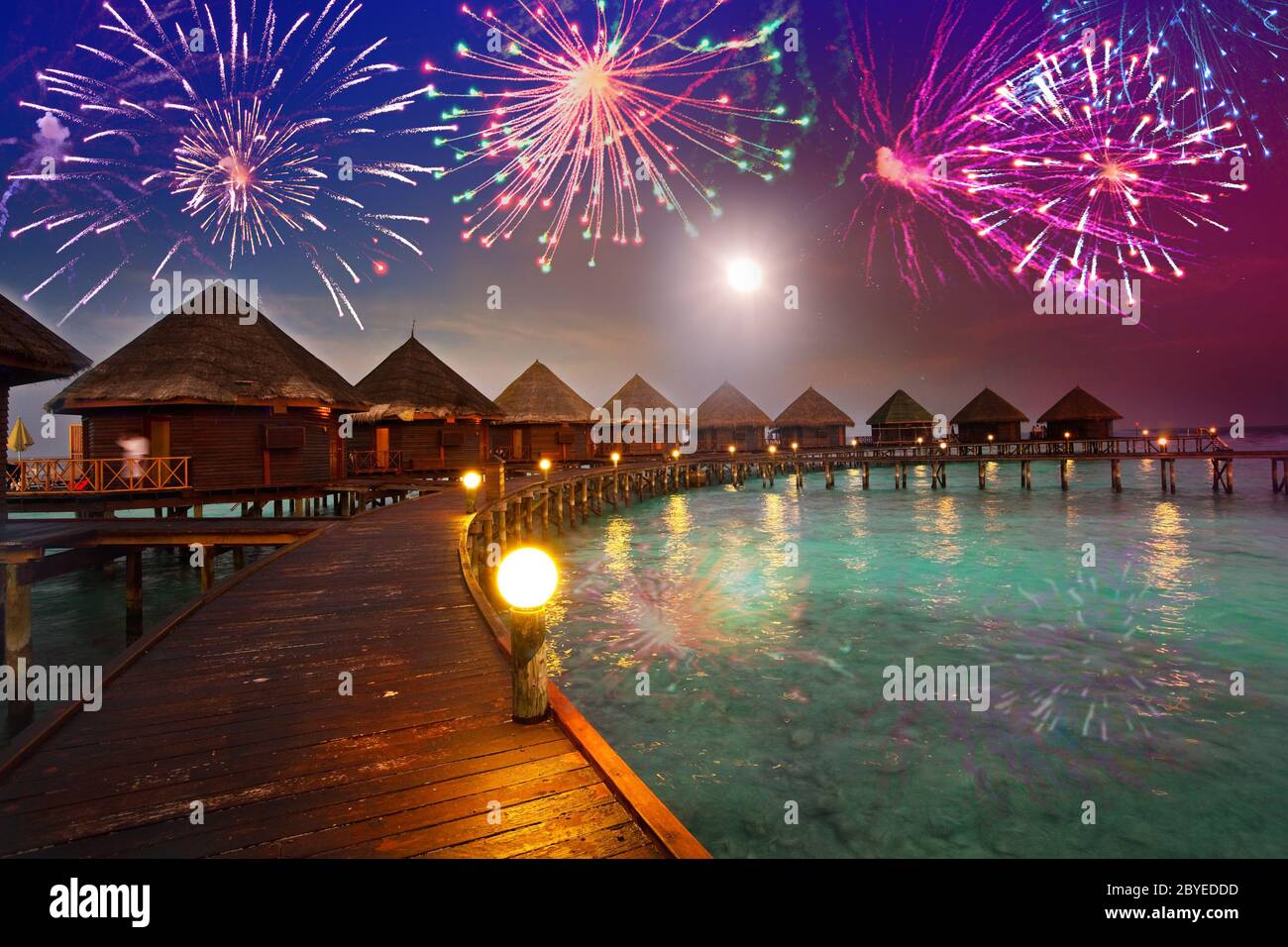 Festive New Year's fireworks over the tropical isl Stock Photo - Alamy