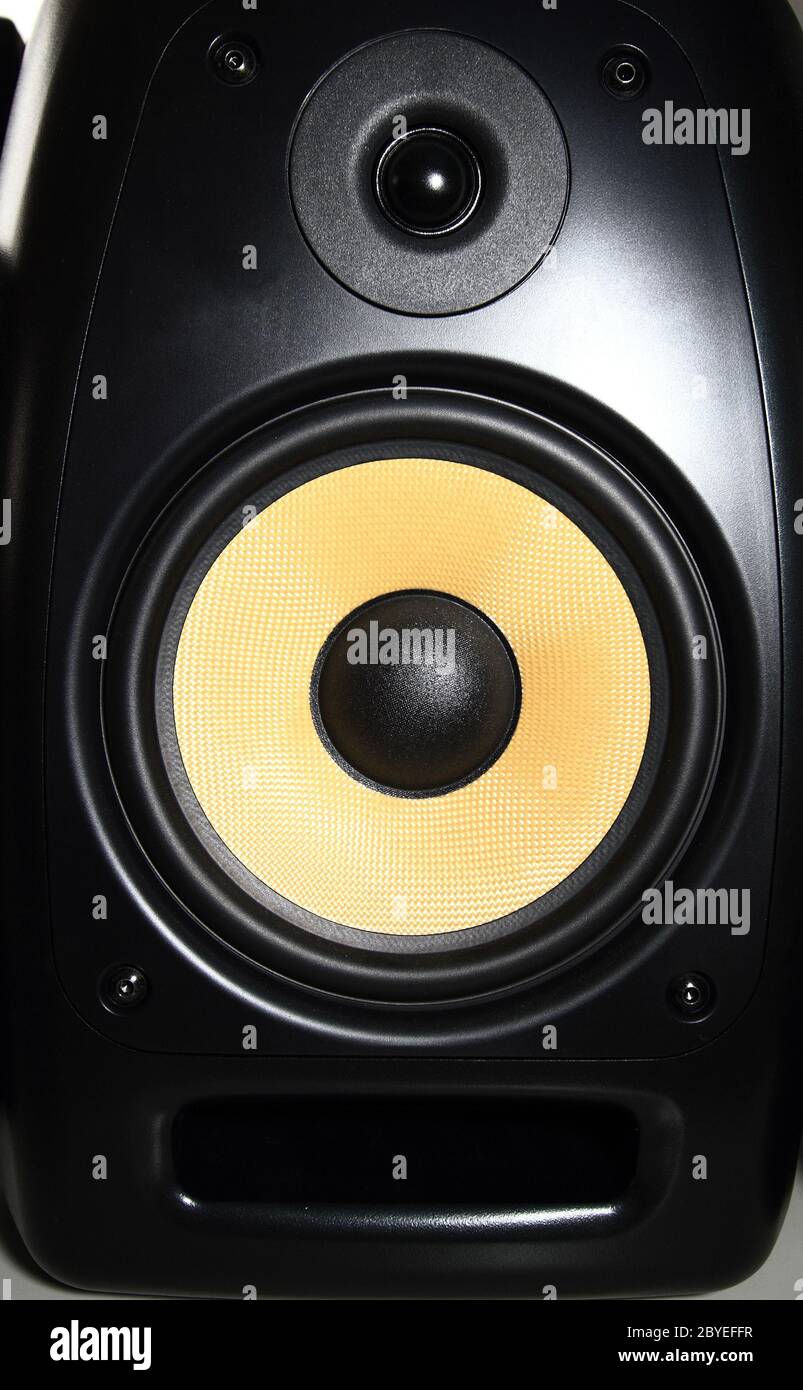 Closeup of a yellow speaker sub woofer Stock Photo - Alamy