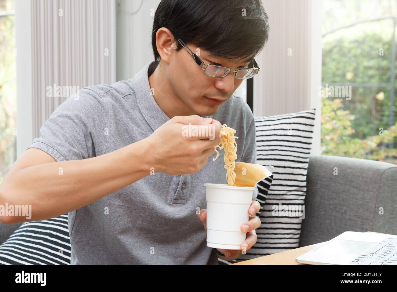 Work from home,Businessman working remotely from home. Using computer ...