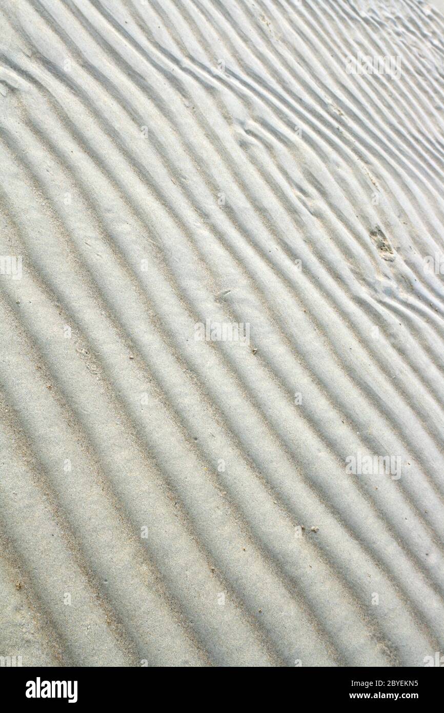 Pattern of sand beach ripple background, vertical Stock Photo - Alamy