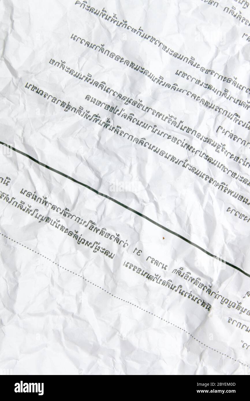Wrinkled paper with text Stock Photo - Alamy