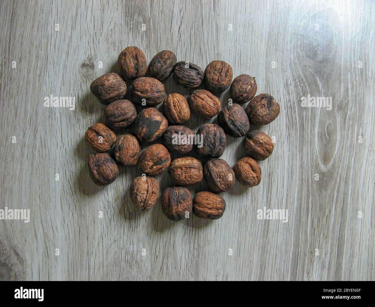Forest walnut on wooden background. Healthy nut food for brain. Close ...