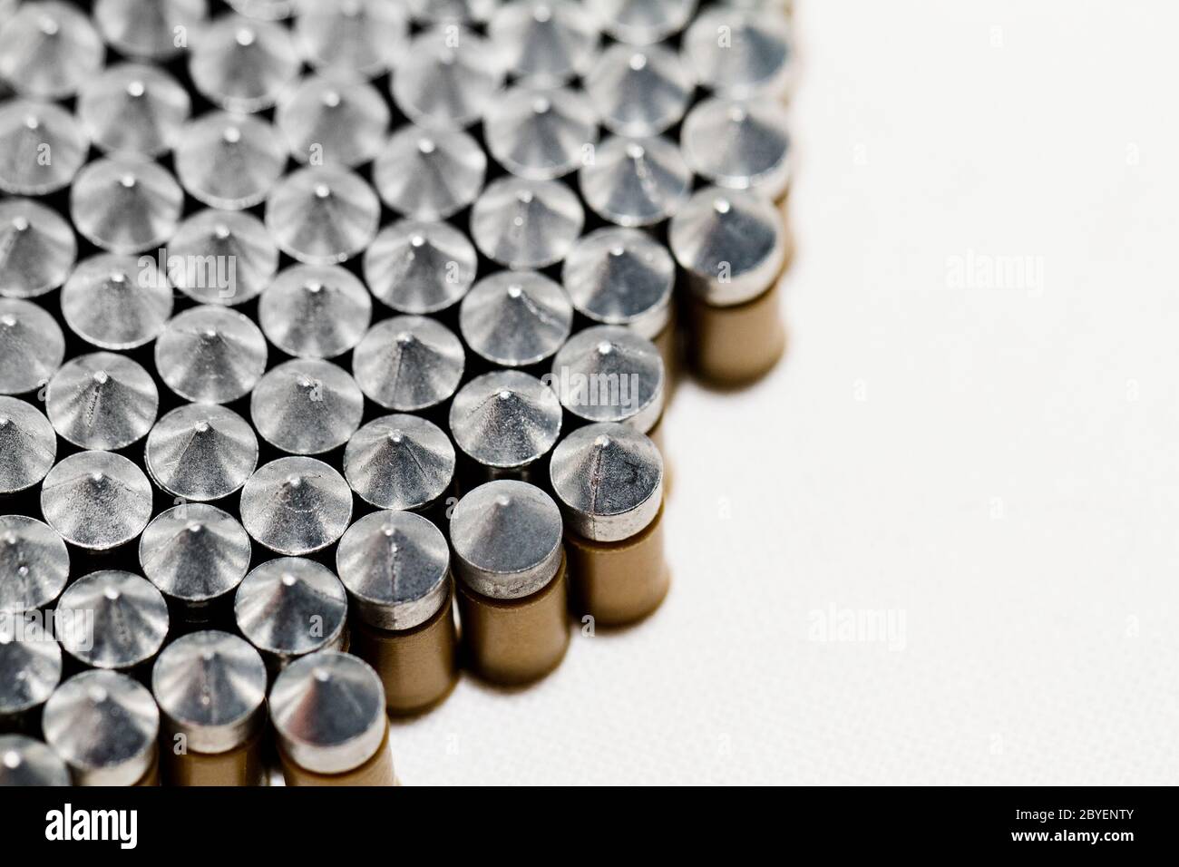 Gun bullets over white background Stock Photo - Alamy