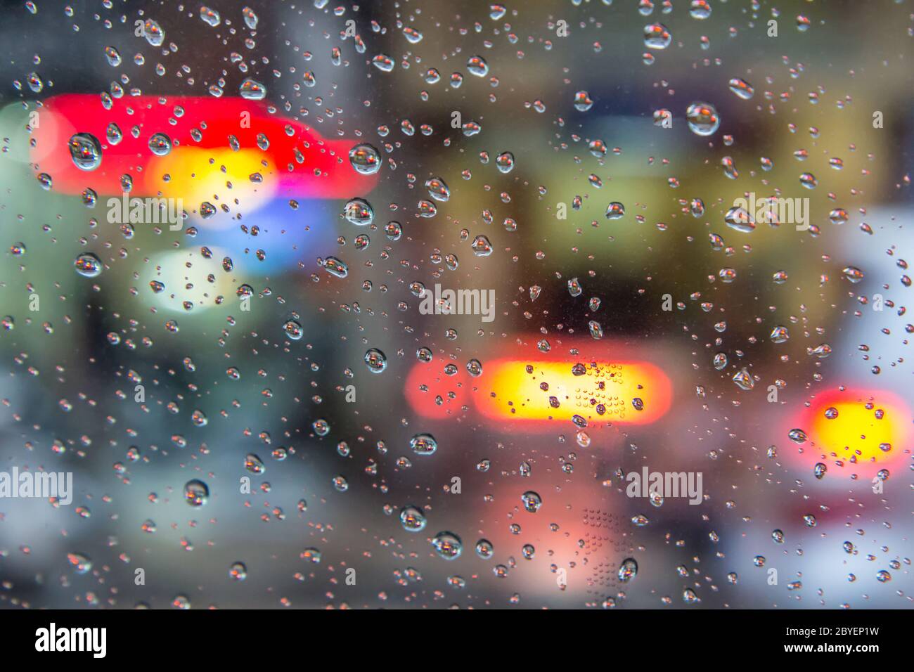 Multi-coloured drops of water for background Stock Photo - Alamy