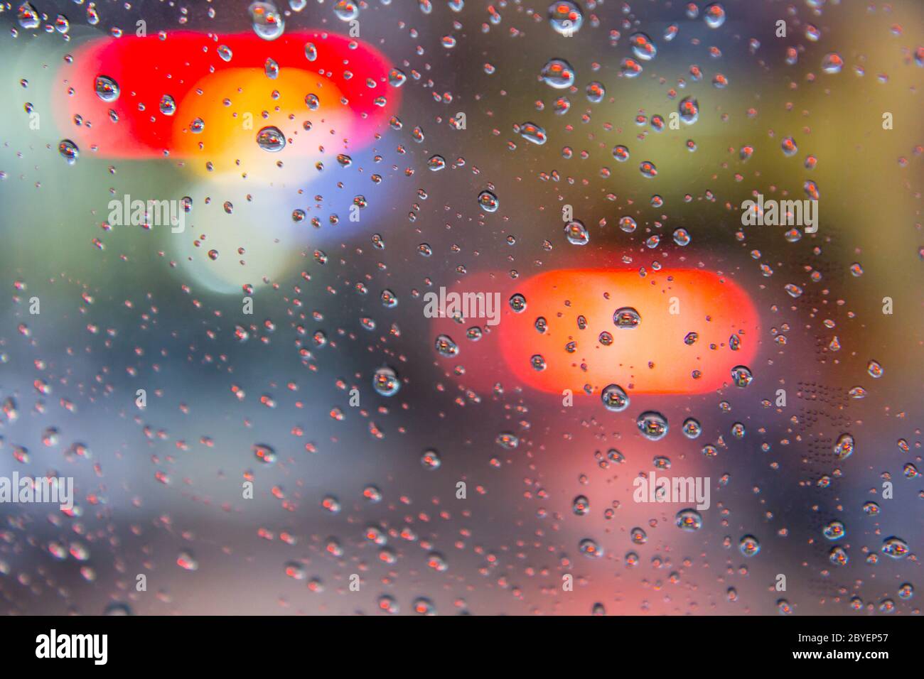 Multi-coloured drops of water for background Stock Photo - Alamy