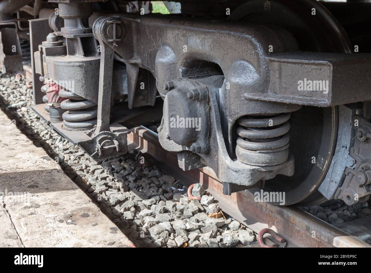 closeup wheel break and suspension system of diesel train Stock Photo ...