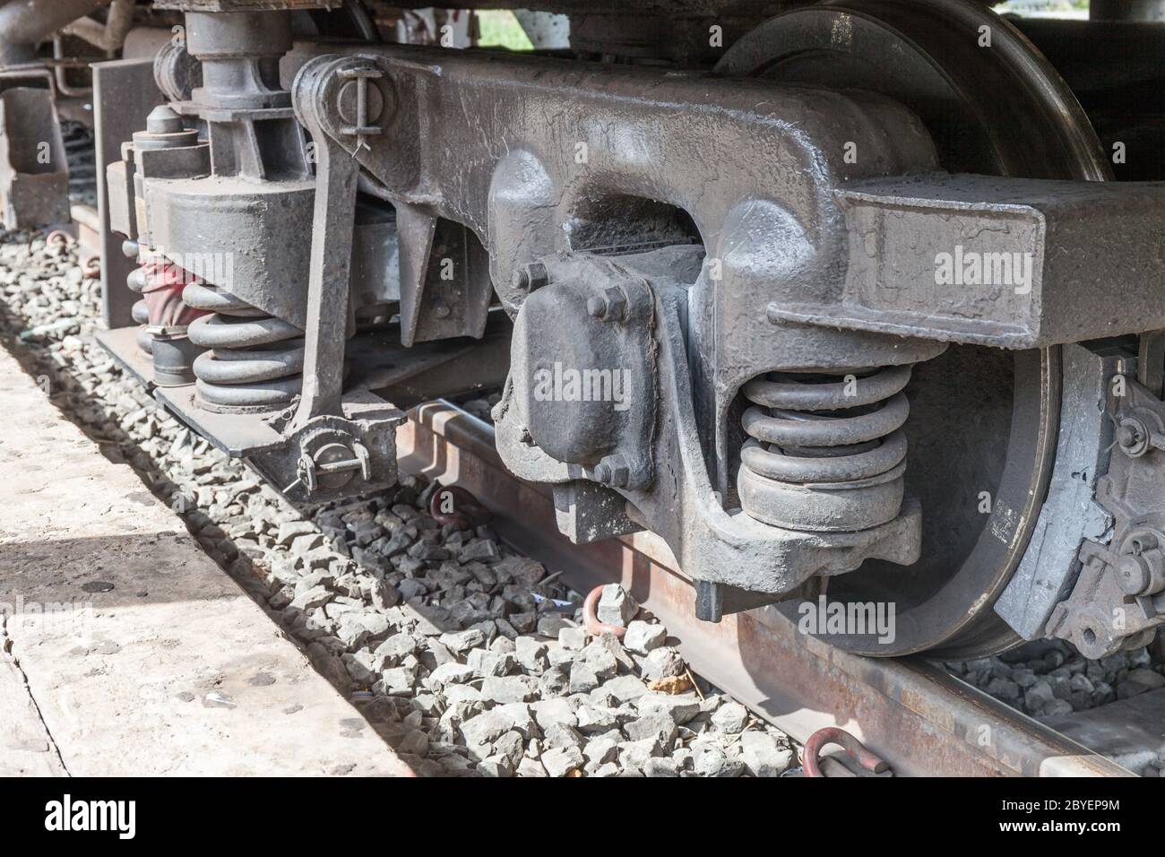 closeup wheel break and suspension system of diesel train Stock Photo ...