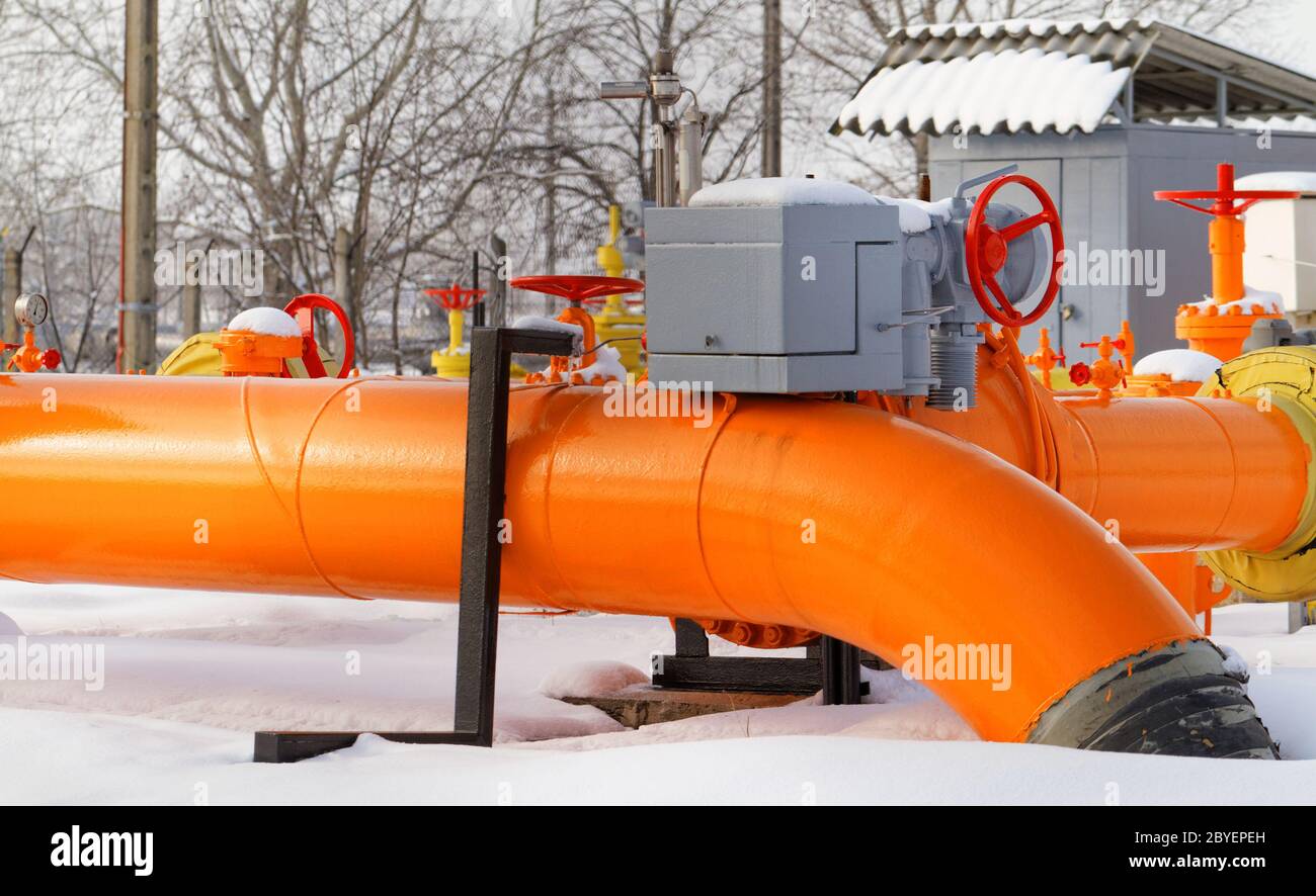 Orange gas pipe in frosted winter Stock Photo - Alamy
