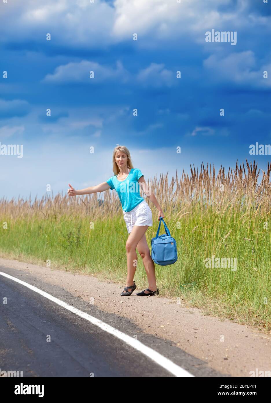 Girl hitchhiking hi-res stock photography and images - Alamy