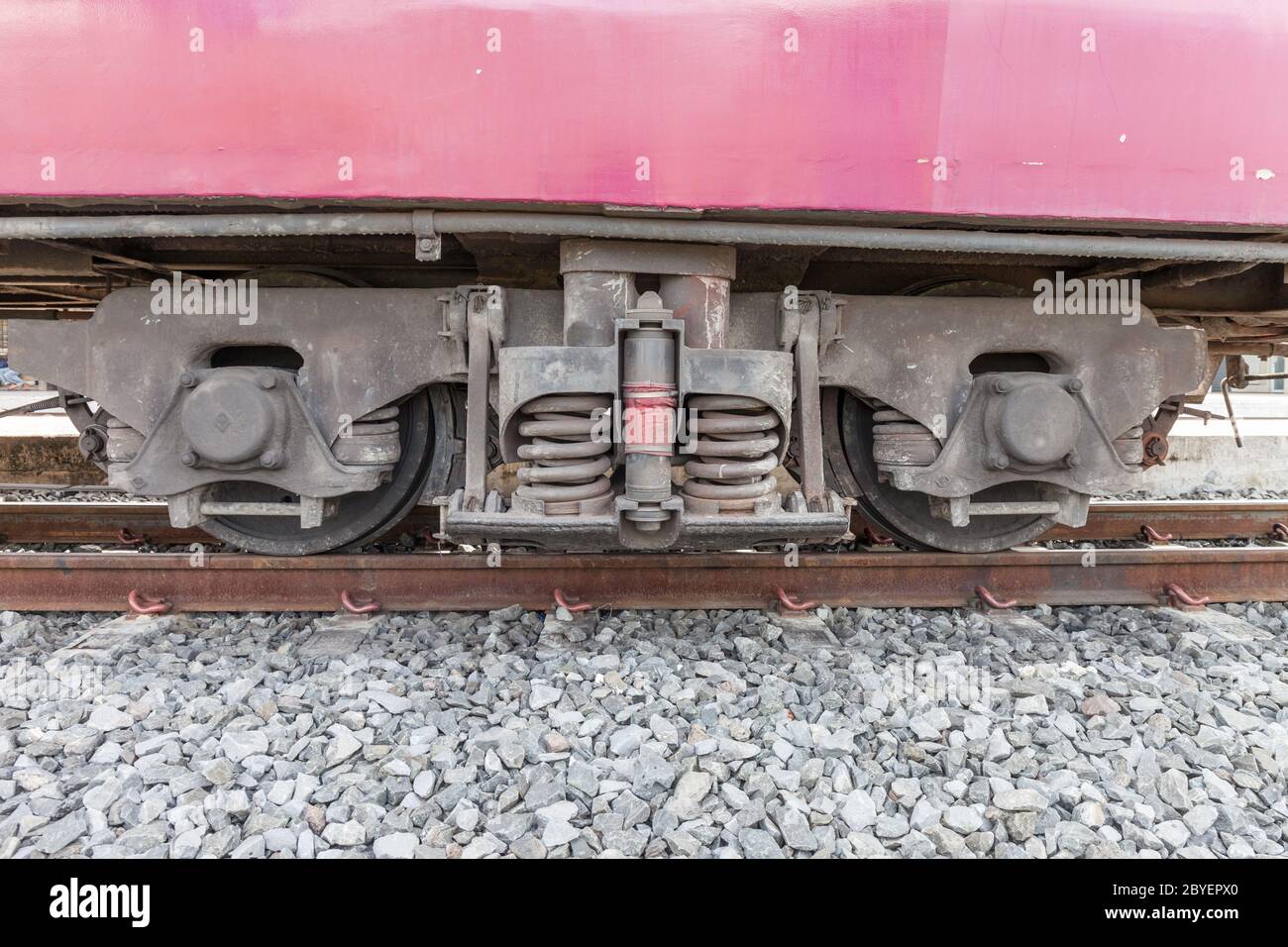 closeup wheel break and suspension system of diesel train Stock Photo ...
