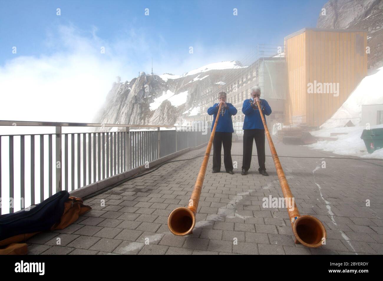 Alpine horns Player Stock Photo - Alamy