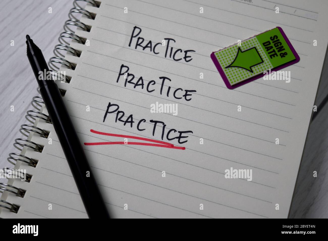 Practice. Practice. Practice text on a book isolated on office desk ...