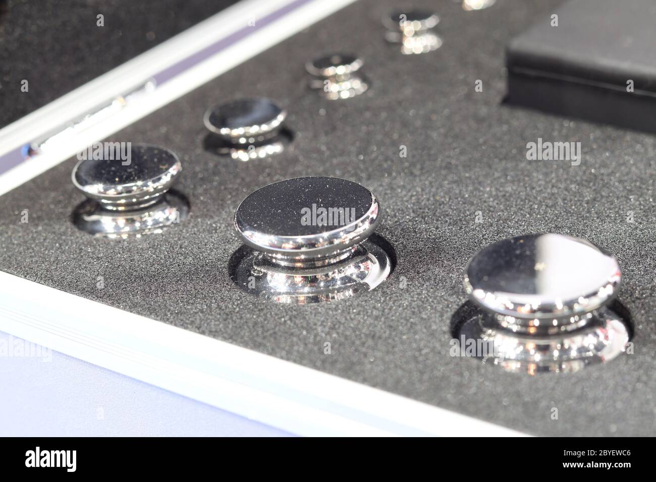 set of standard weight in box for calibration process ; quality control ...