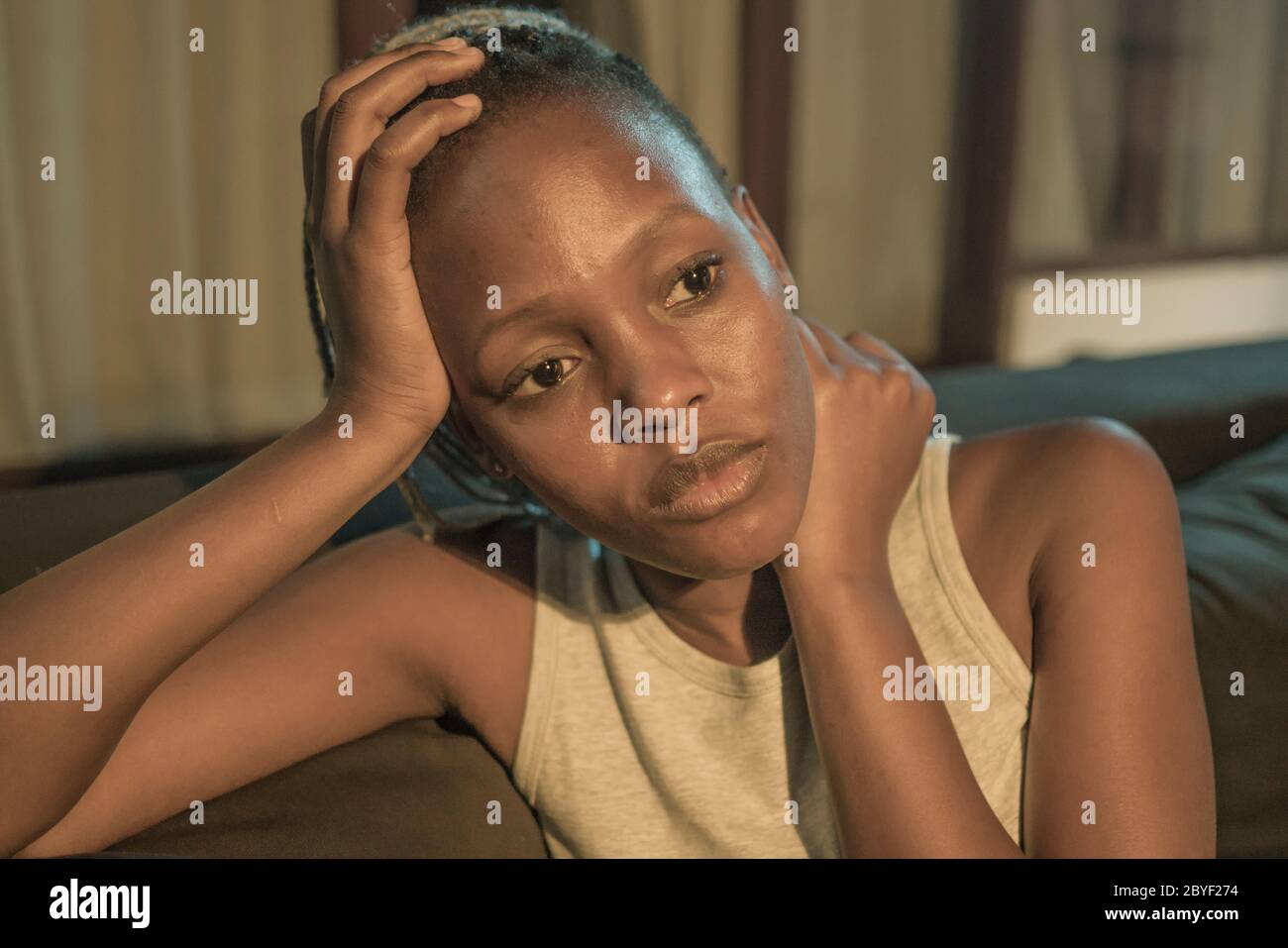 young Afro American woman suffering depression - sad and depressed ...