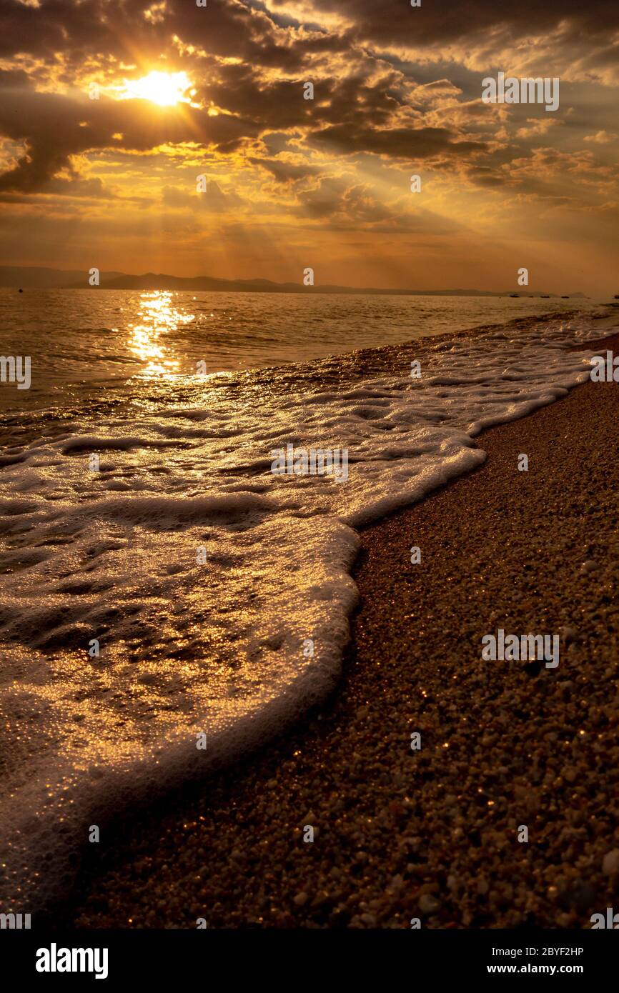 Beautiful Sunset at the beach Stock Photo - Alamy