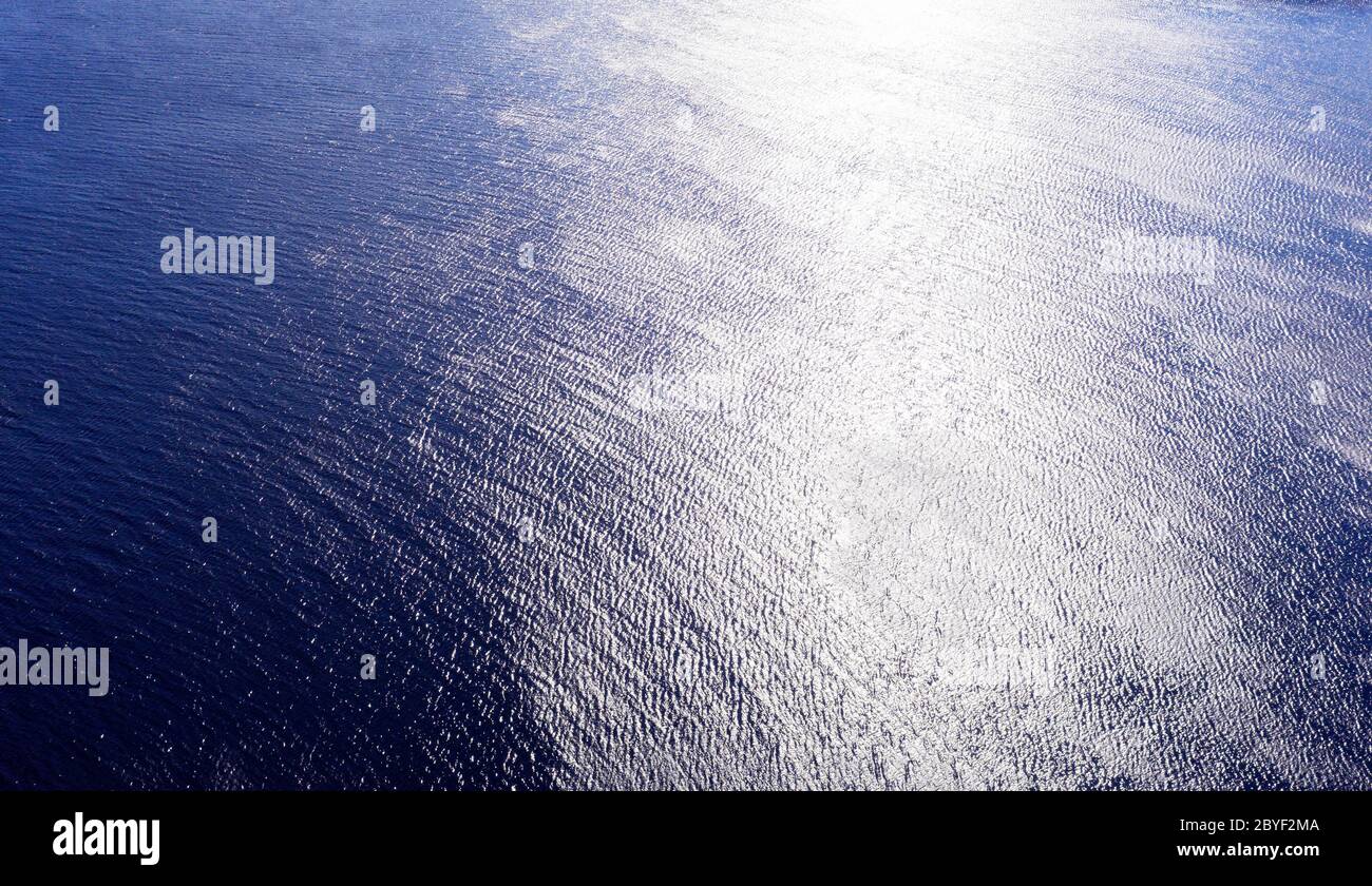 Aerial view of a crystal clear sea water texture. View from above ...