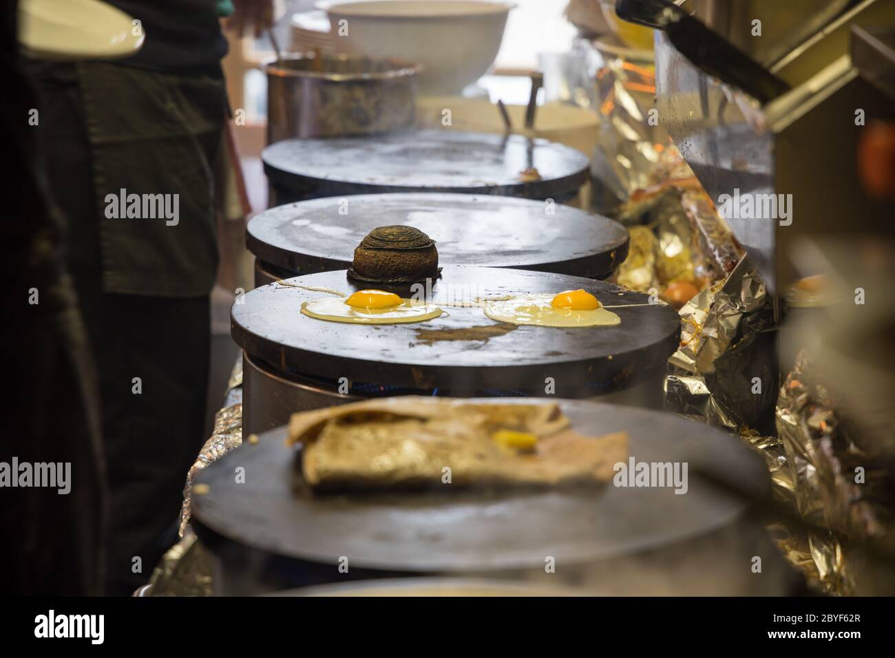 French chef cooking traditional galette in Rennes ,France Stock Photo ...