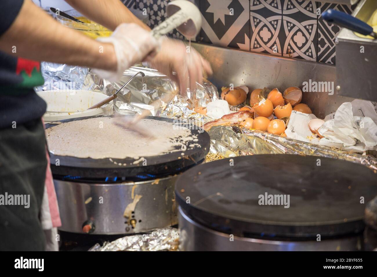 French chef cooking traditional galette in Rennes ,France Stock Photo ...