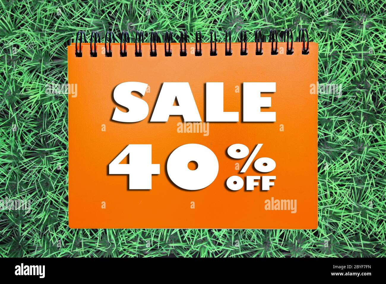 40% Sale sign on grass background Stock Photo - Alamy
