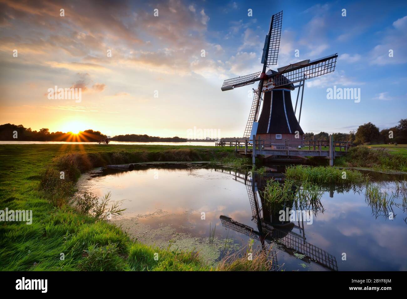 Windmill with sun star hi-res stock photography and images - Alamy