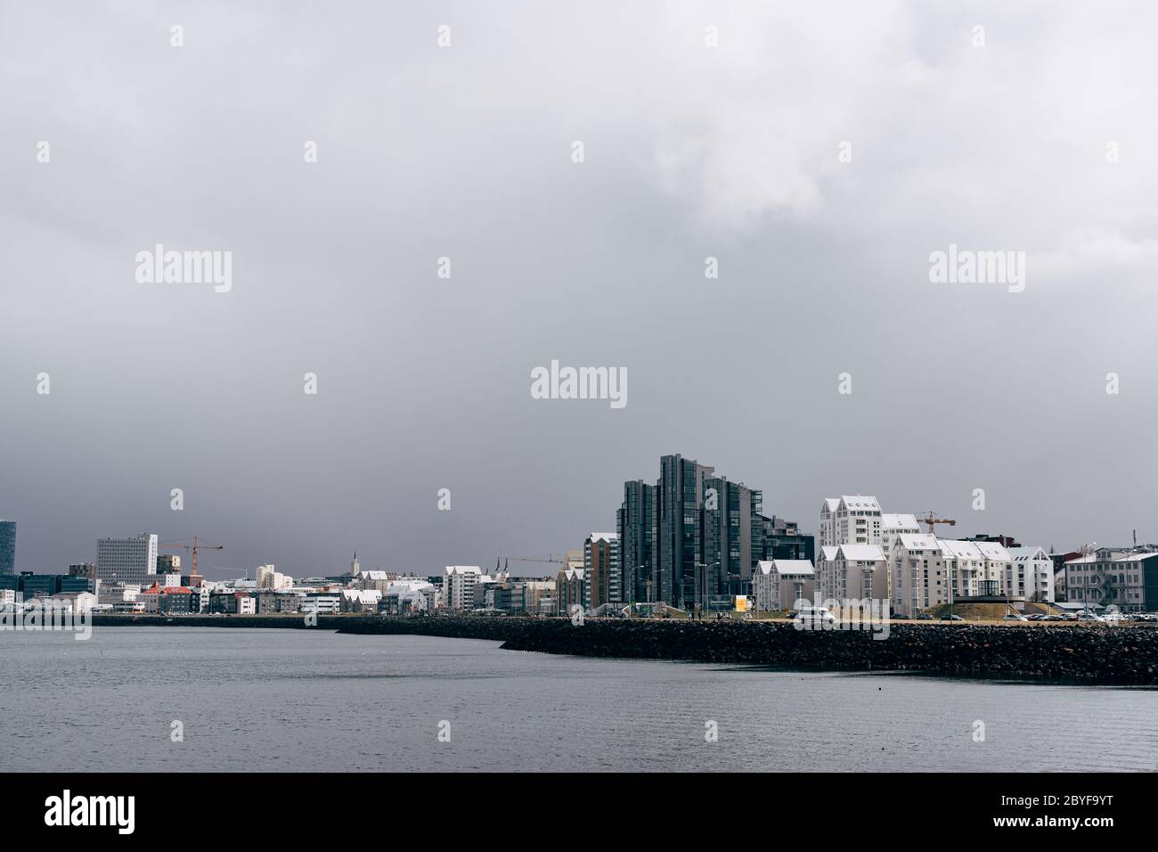 Multi-storey modern high-rise buildings on the waterfront in Reykjavik ...