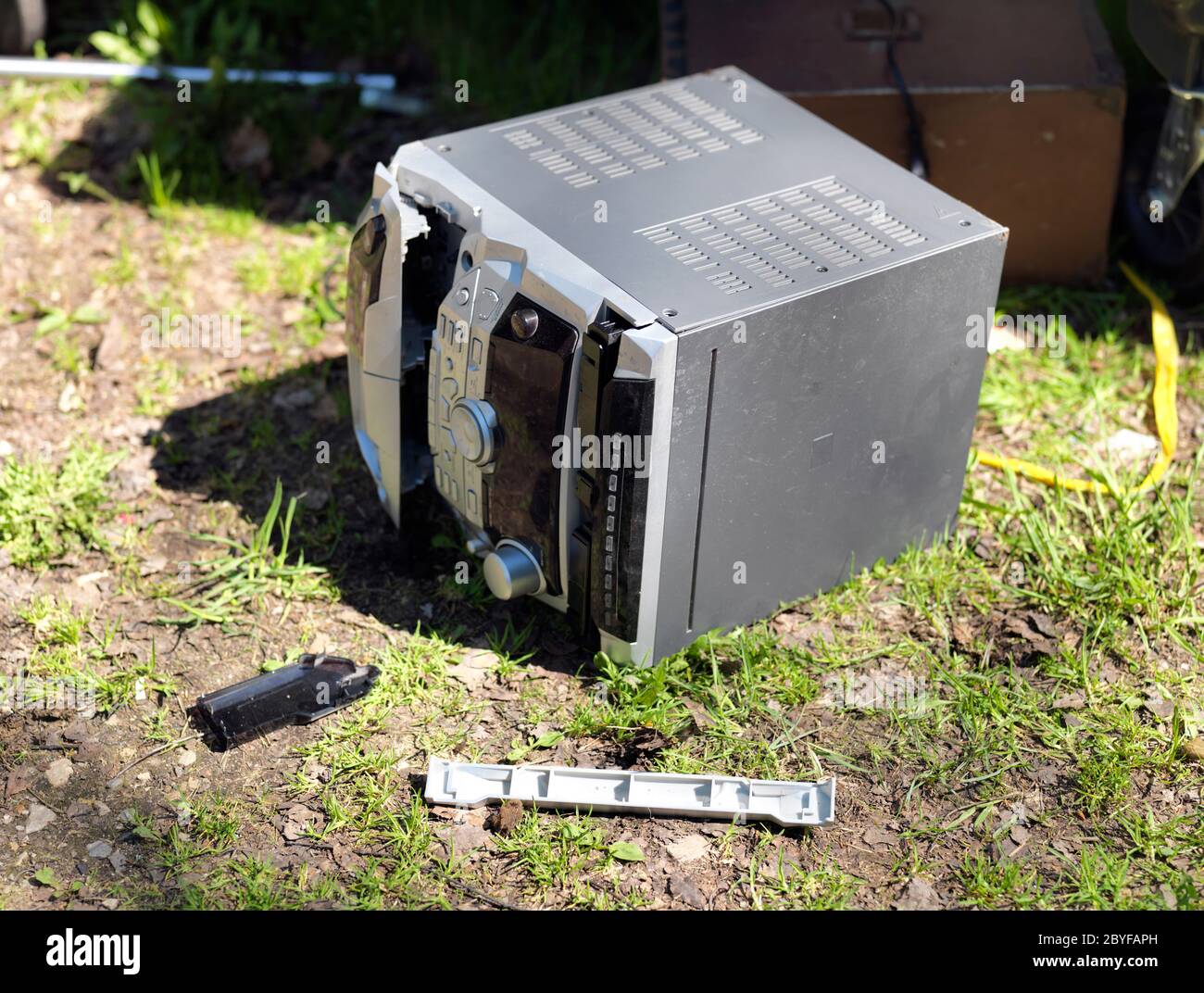 Discarded crashed music stereo center dropped on a ground Stock Photo ...