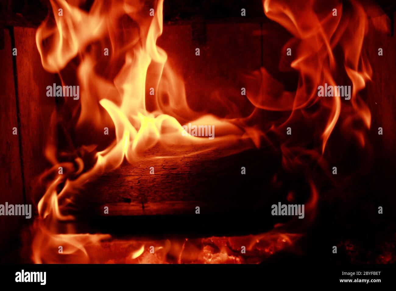 Fire flames with reflection on black background Stock Photo - Alamy
