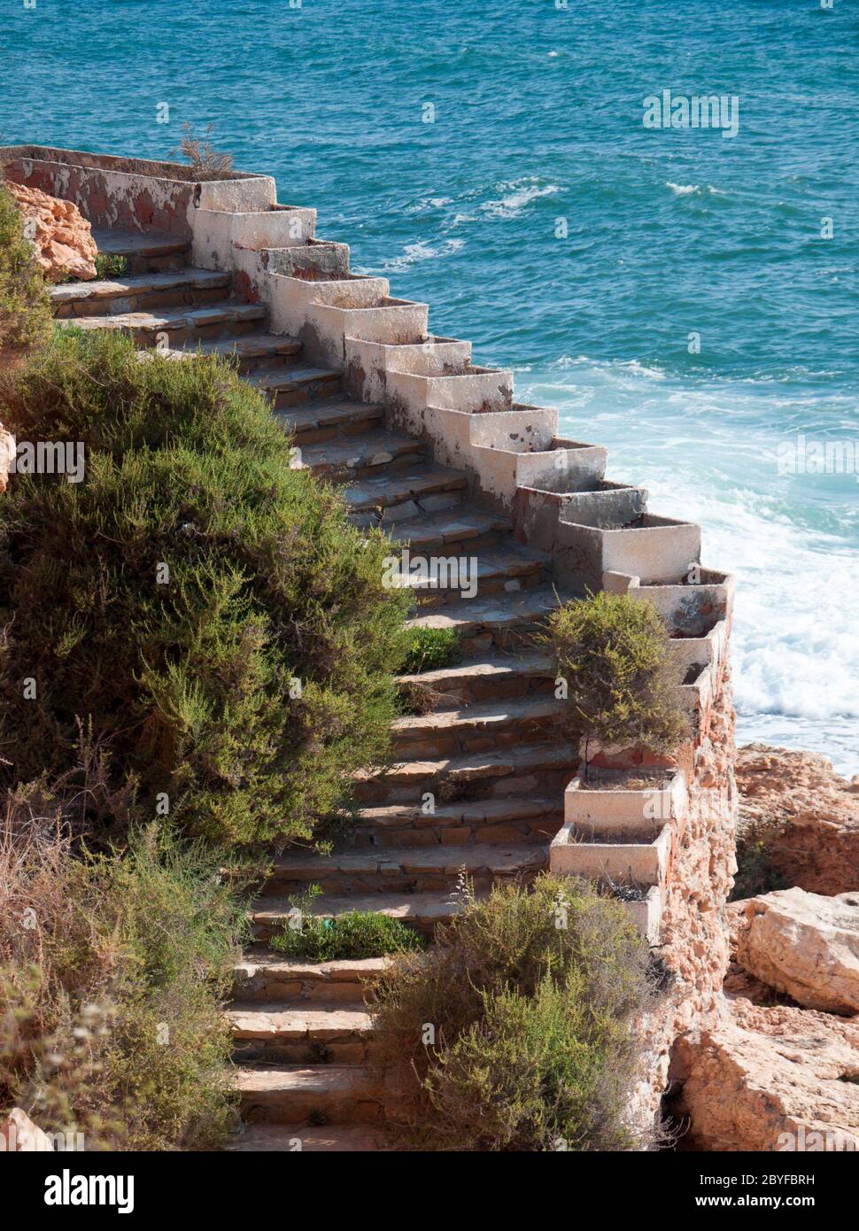 Stone staircase by the Mediterranean sea Stock Photo - Alamy