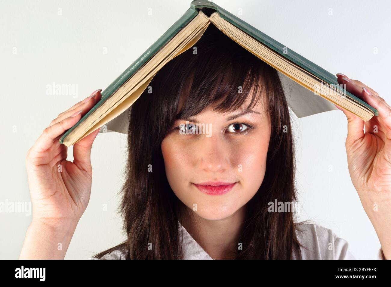 Teenager under desk hi-res stock photography and images - Alamy