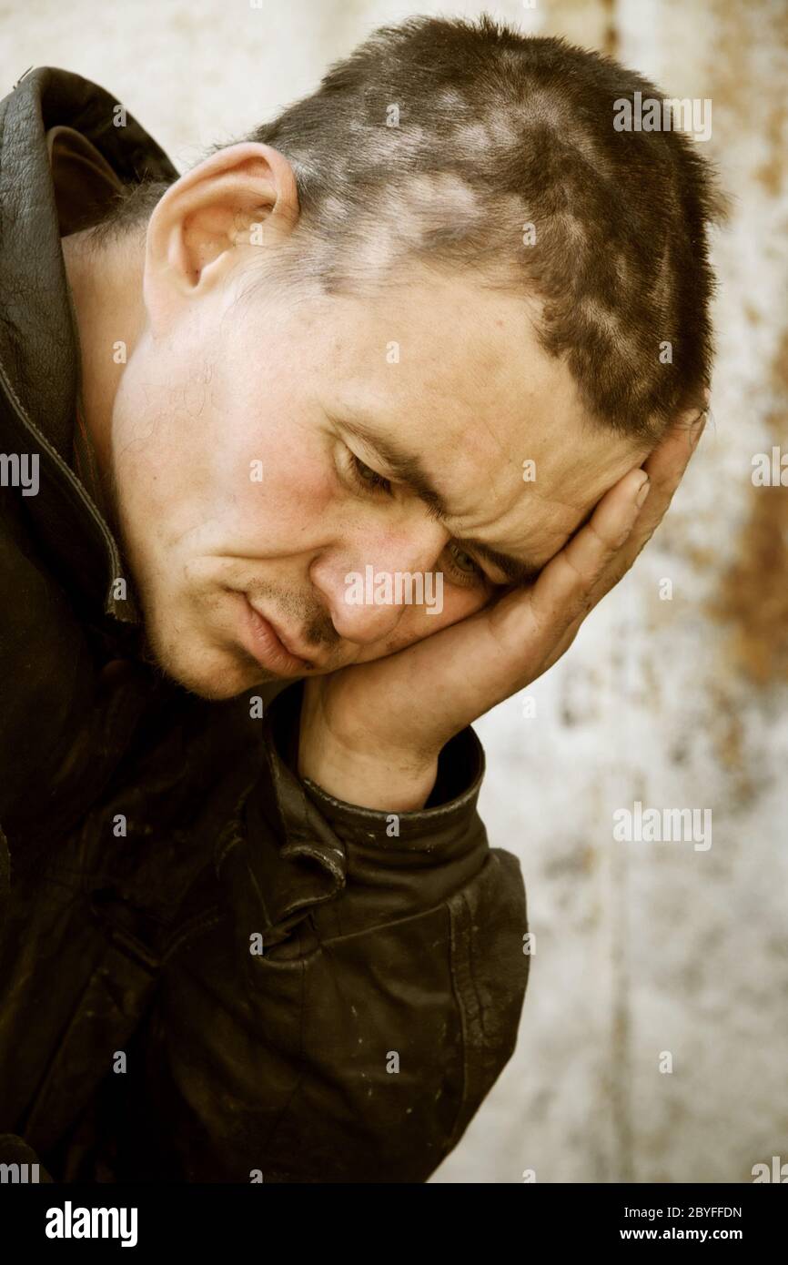 Homeless man in despair Stock Photo - Alamy