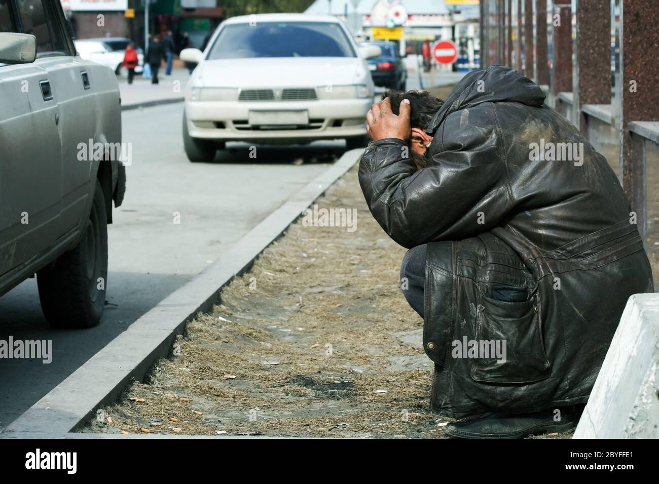 Homeless man in despair Stock Photo - Alamy