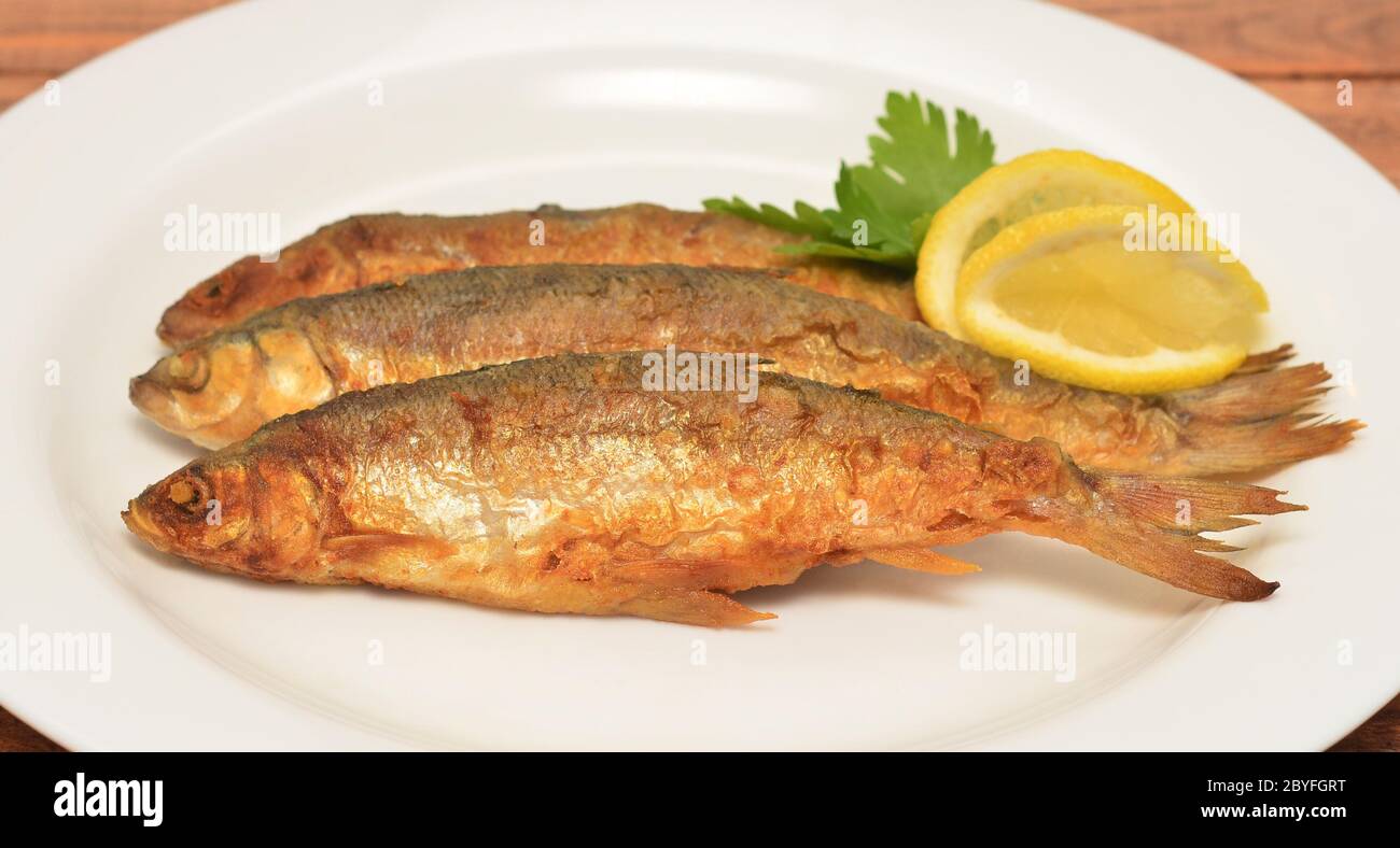Juicy fried fish hi-res stock photography and images - Alamy