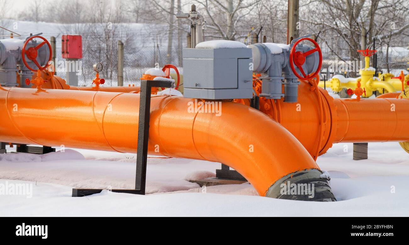 Orange gas pipe in frosted winter Stock Photo - Alamy