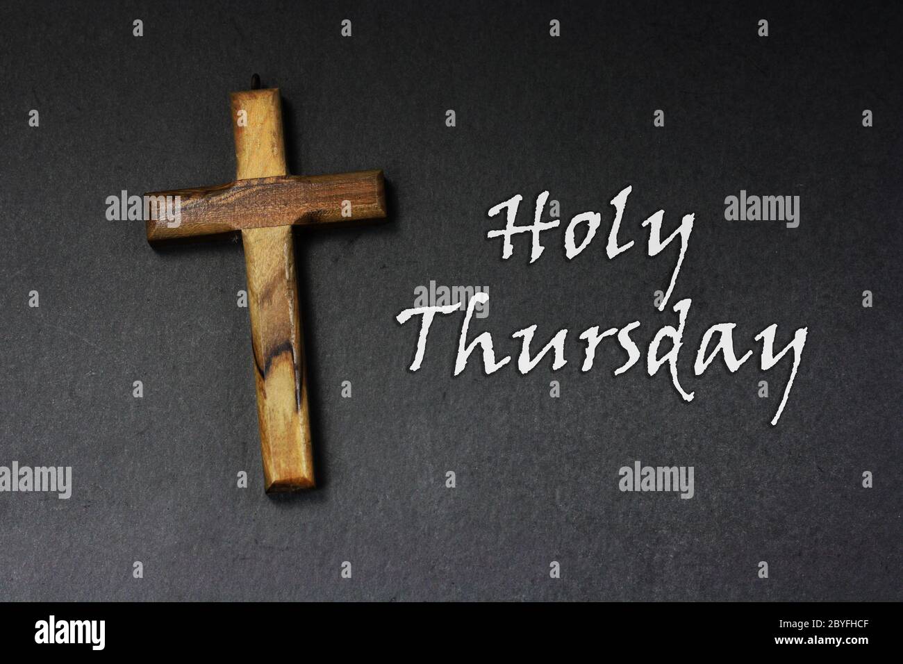 Holy Thursday wording with wooden cross and dark background Stock Photo ...
