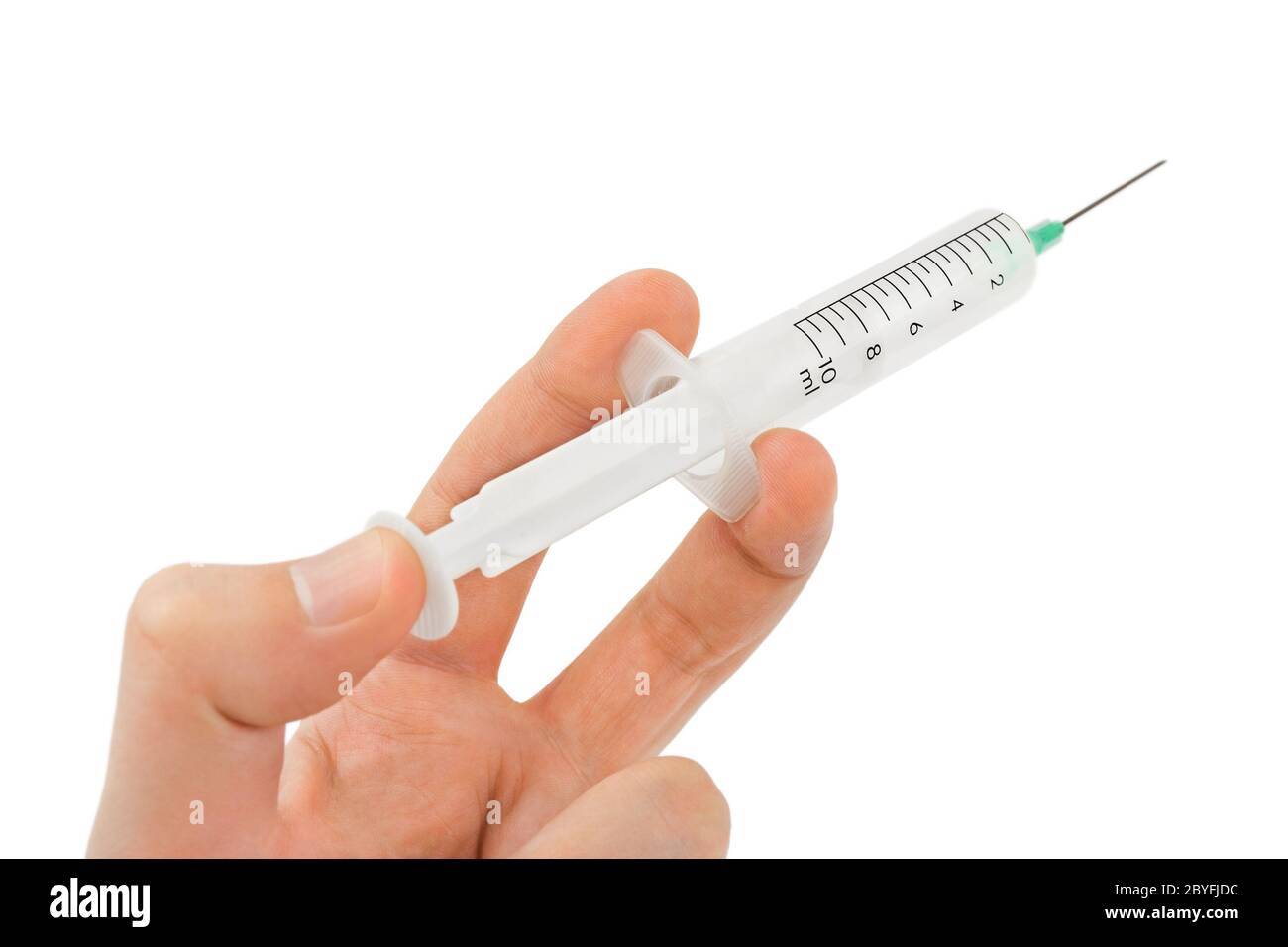 Syringe in hand Stock Photo - Alamy