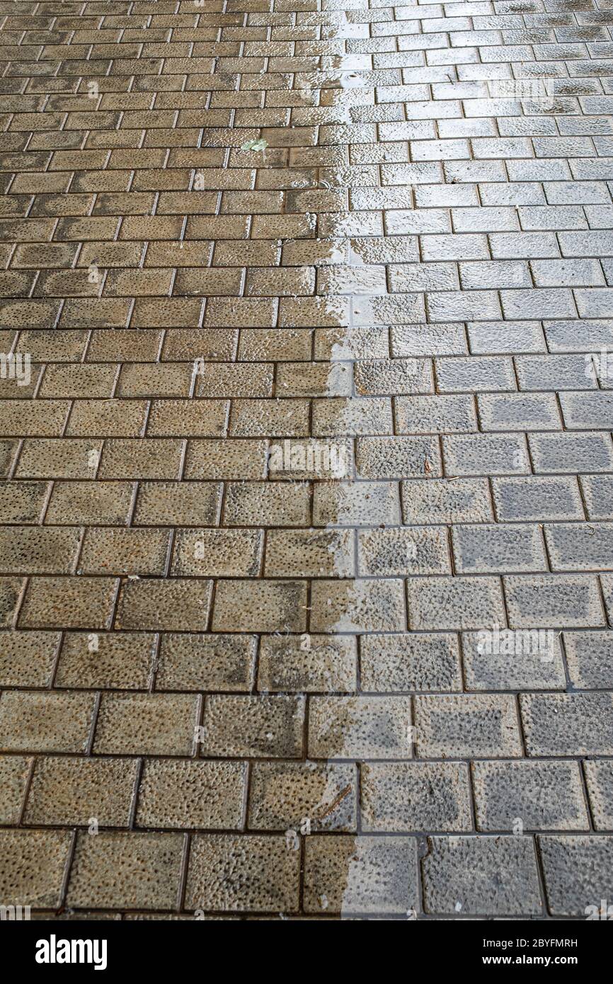 Wet urban brick cobble floor outdoor ground Stock Photo - Alamy