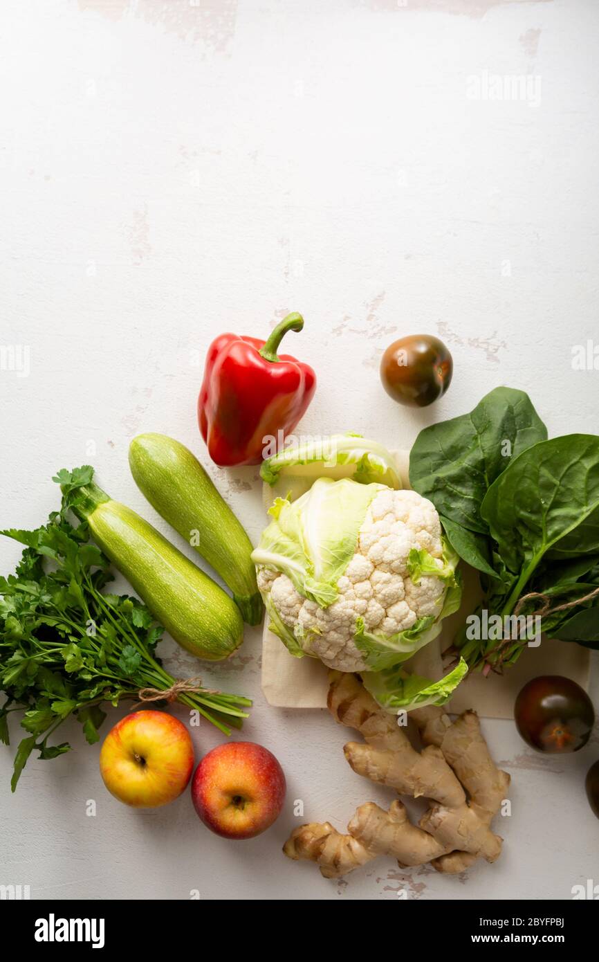 Fresh organic produce on white surface Stock Photo - Alamy