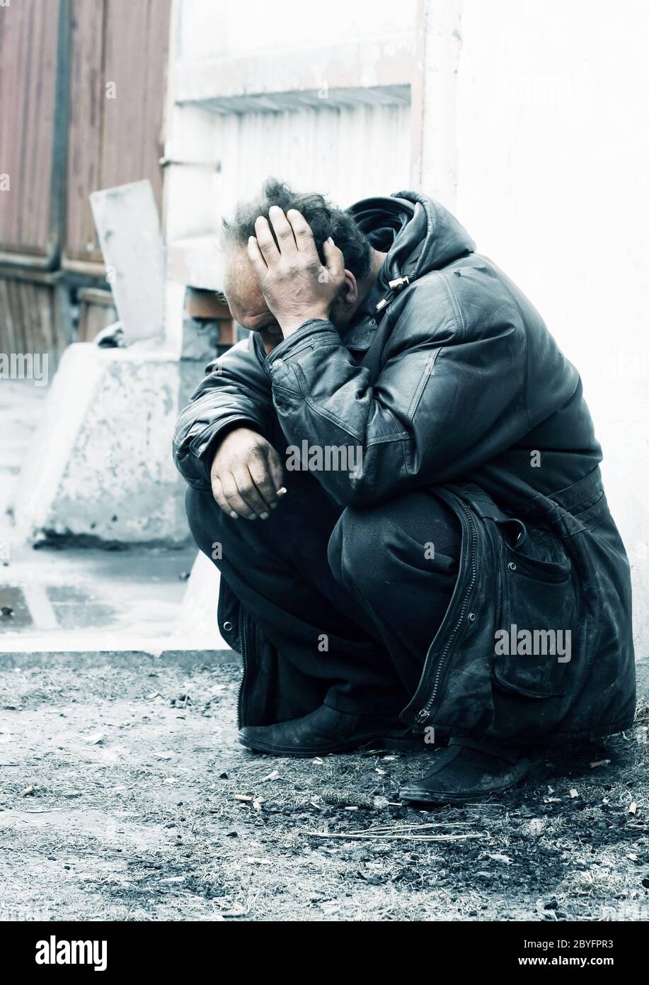 Sad homeless man Stock Photo - Alamy