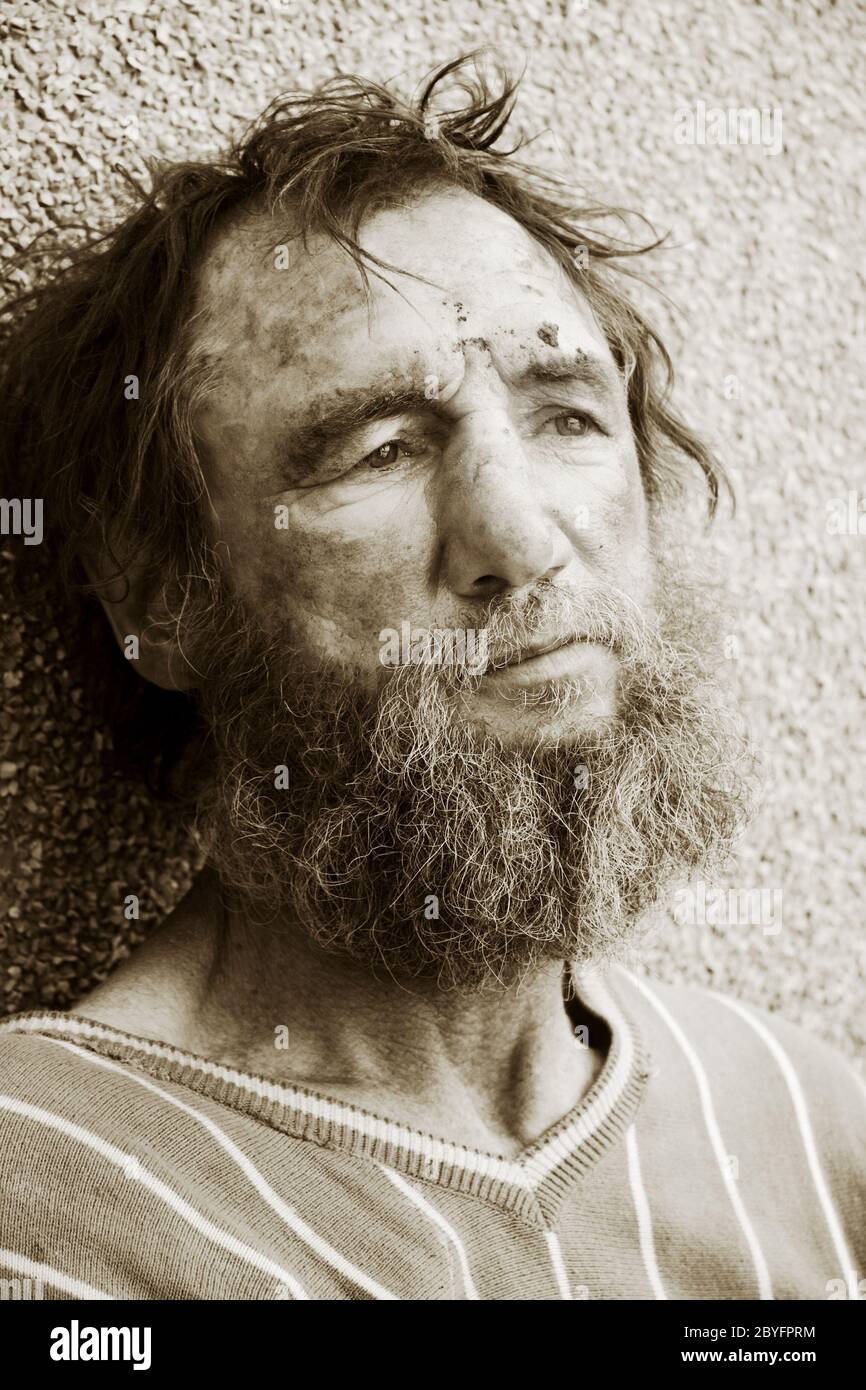 Sad homeless man Stock Photo - Alamy