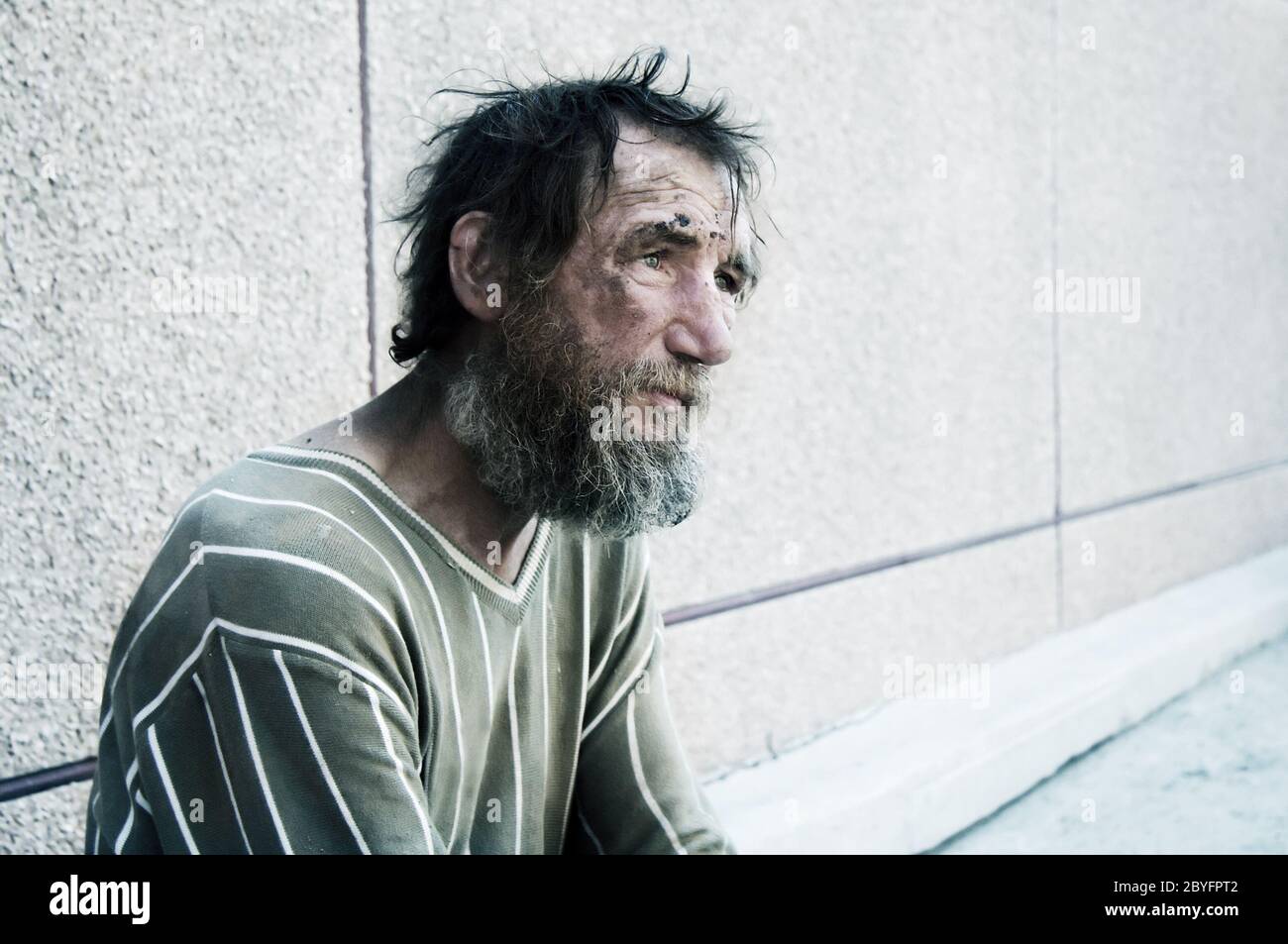 Sad homeless man Stock Photo - Alamy
