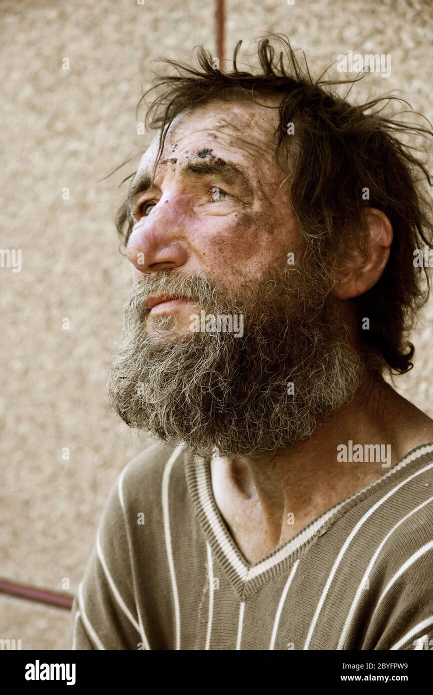 Sad homeless man Stock Photo - Alamy