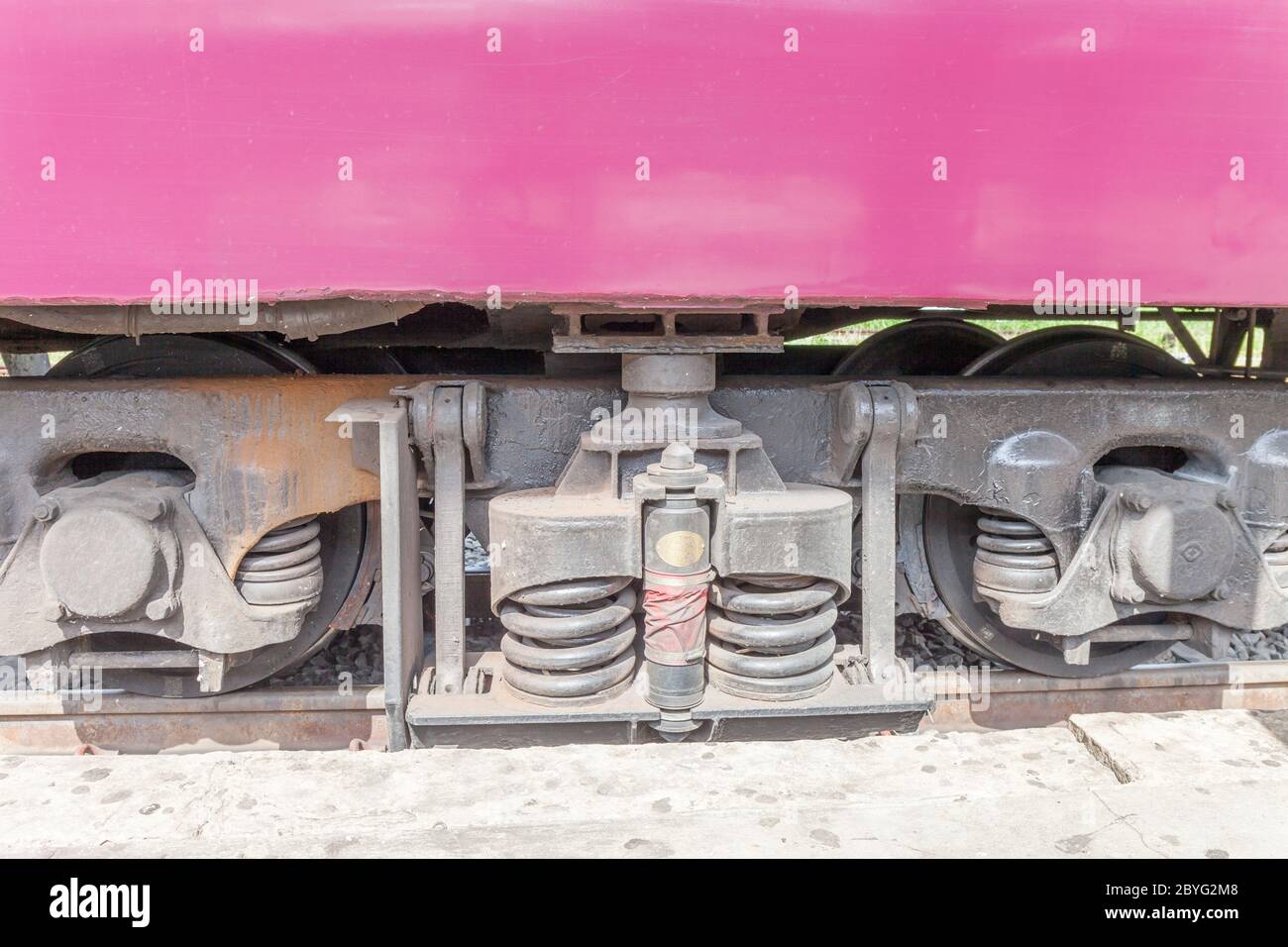 closeup wheel break and suspension system of diesel train Stock Photo ...