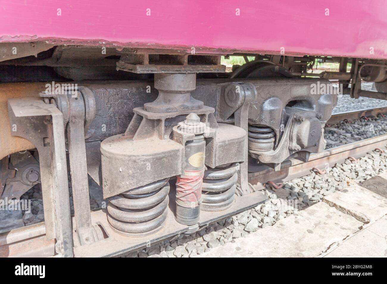 closeup wheel break and suspension system of diesel train Stock Photo ...