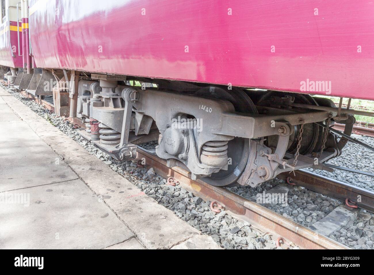 closeup wheel break and suspension system of diesel train Stock Photo ...