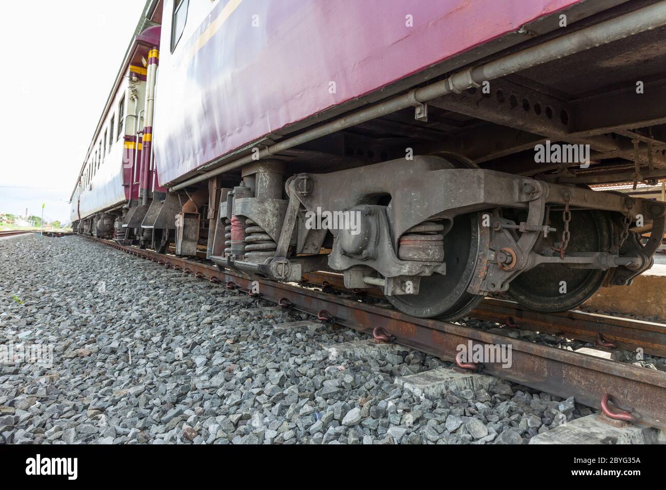 closeup wheel break and suspension system of diesel train Stock Photo ...