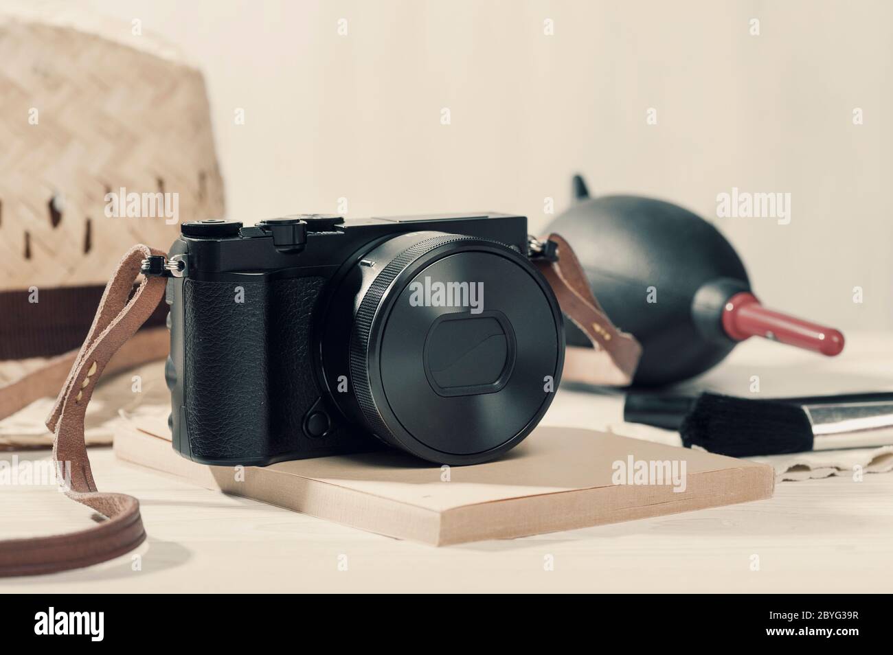 closeup vintage style of digital mirrorless camera with cleaning kits ...