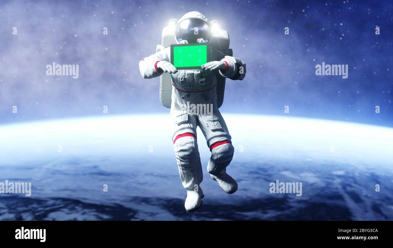 Astronaut in space tablet monitor hi-res stock photography and images ...