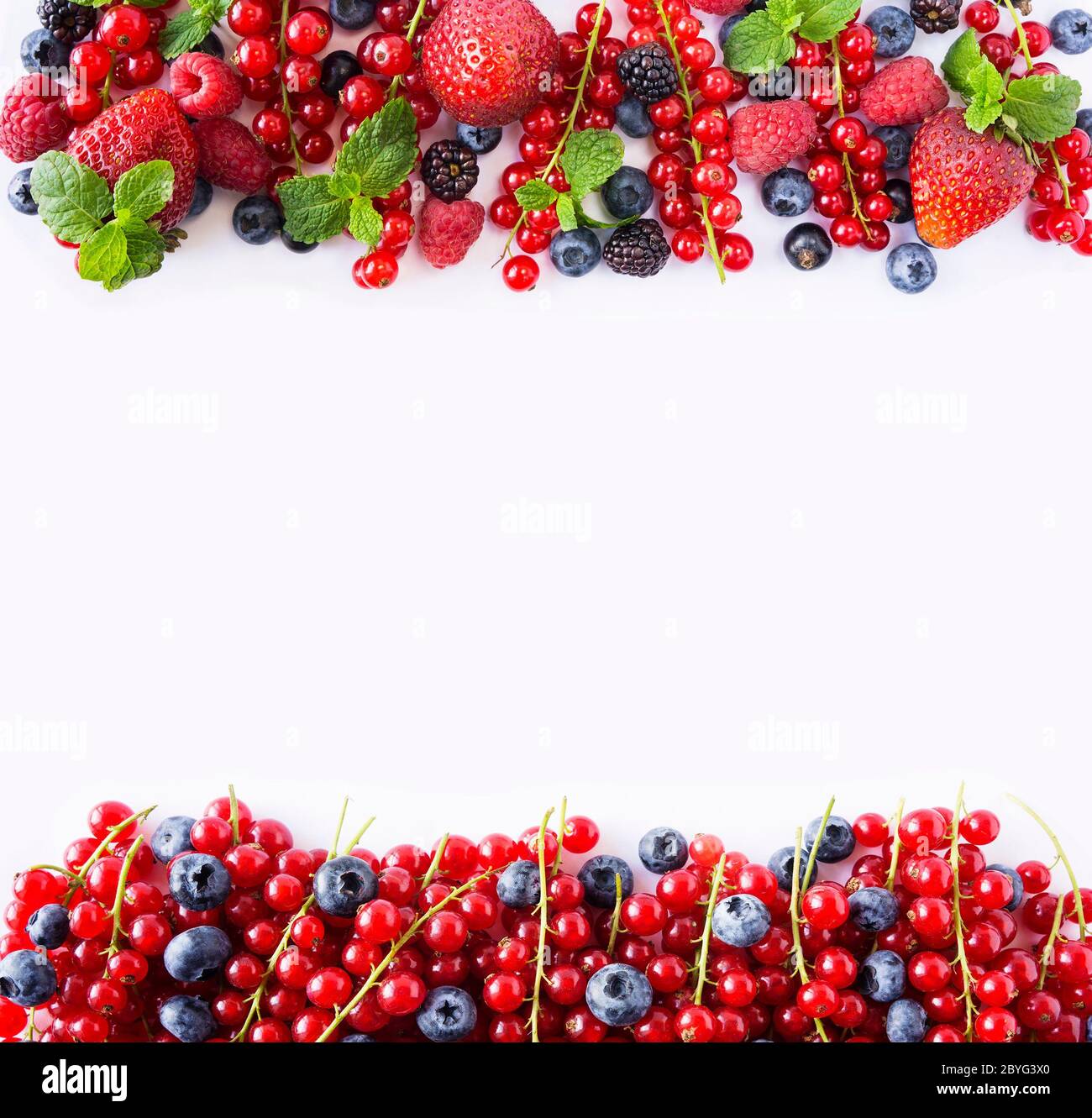 Strawberry border on blue hi-res stock photography and images - Alamy