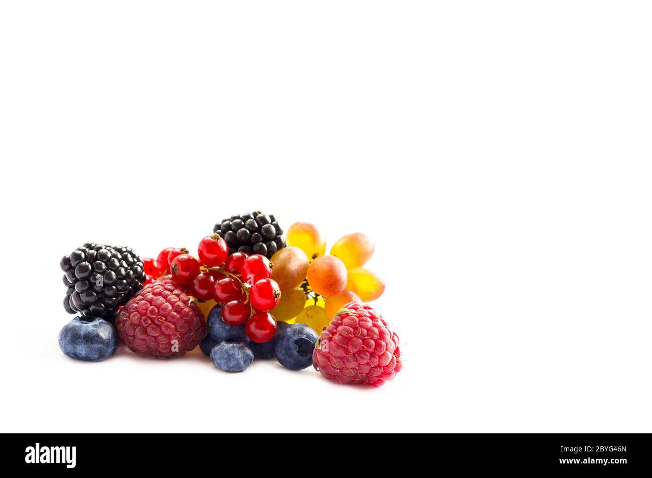 Mixed of fresh fruits and berries isolated on a white background. Ripe ...